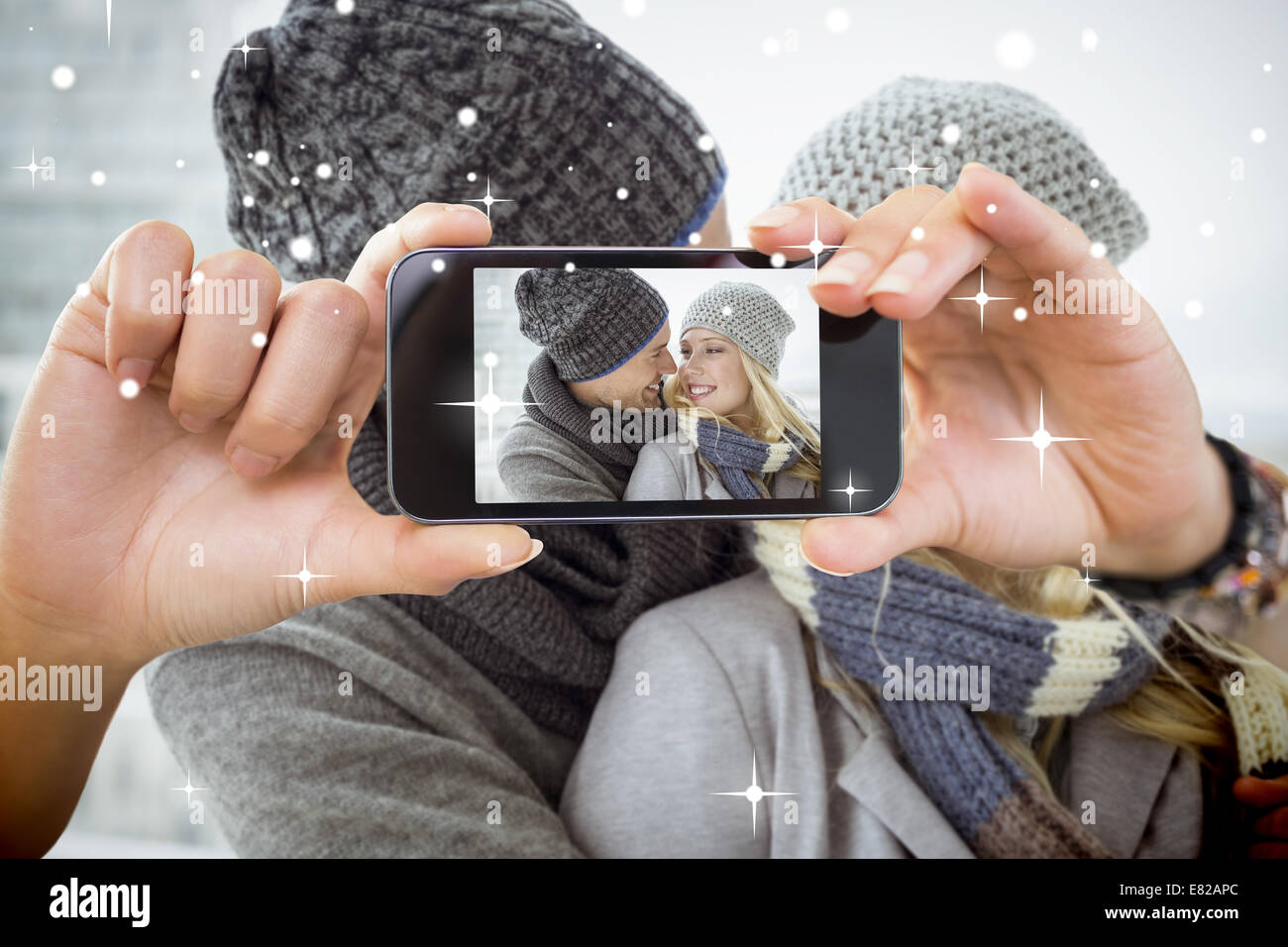 Hand holding smartphone showing photo Stock Photo - Alamy