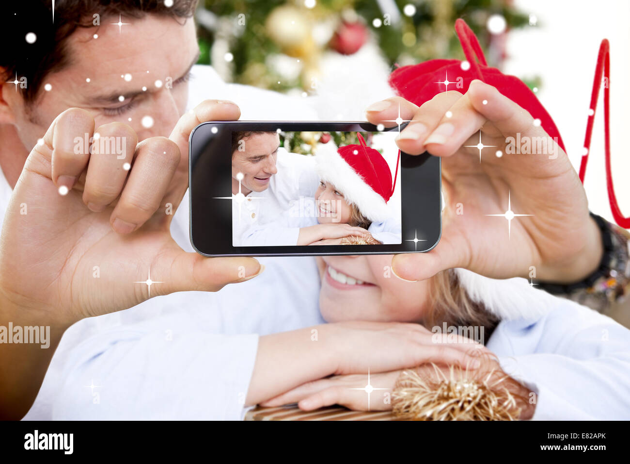 Hand holding smartphone showing photo Stock Photo - Alamy