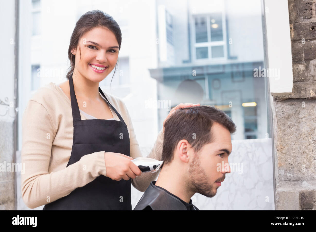 Young happy man getting hair hi-res stock photography and images - Alamy