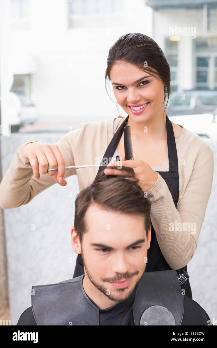 Man getting his hair trimmed Stock Photo - Alamy