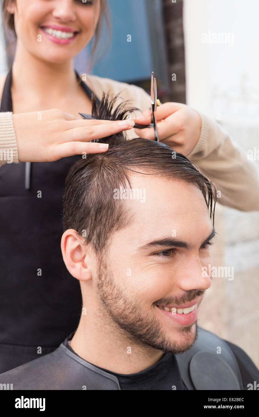 Man getting his hair trimmed Stock Photo - Alamy