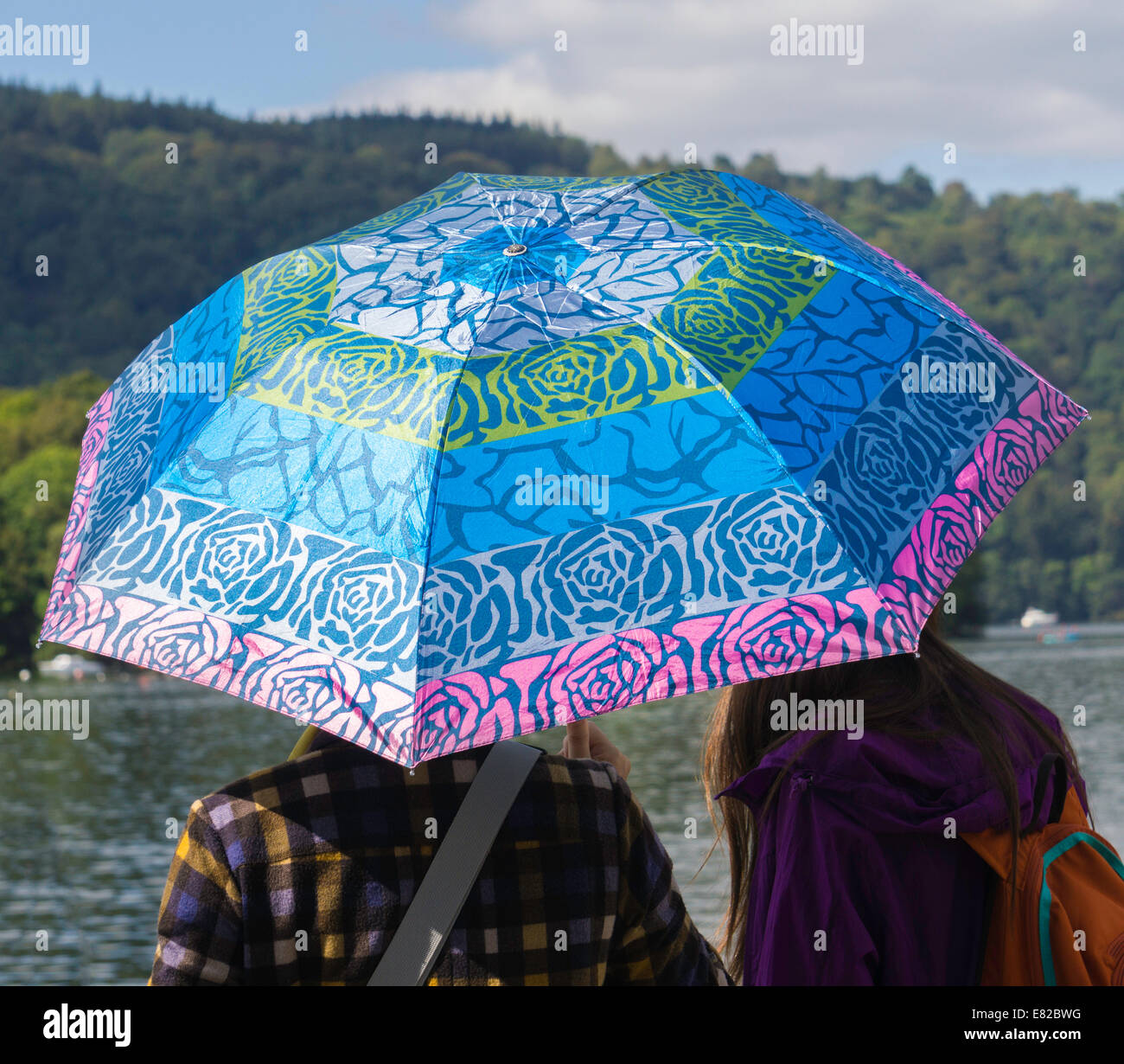 Girls parasol hi-res stock photography and images - Alamy