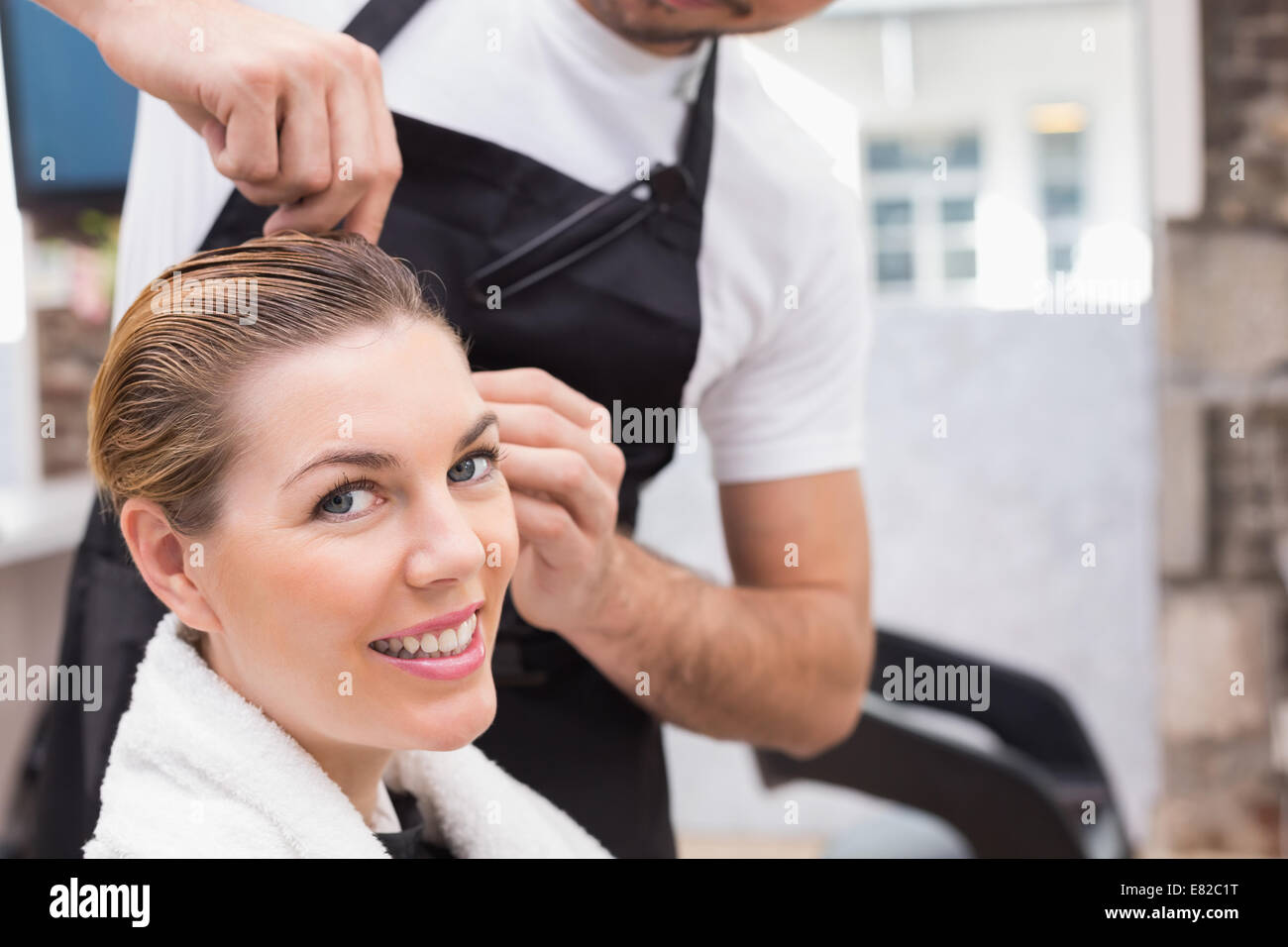 Pretty woman with her hair stylist Stock Photo - Alamy