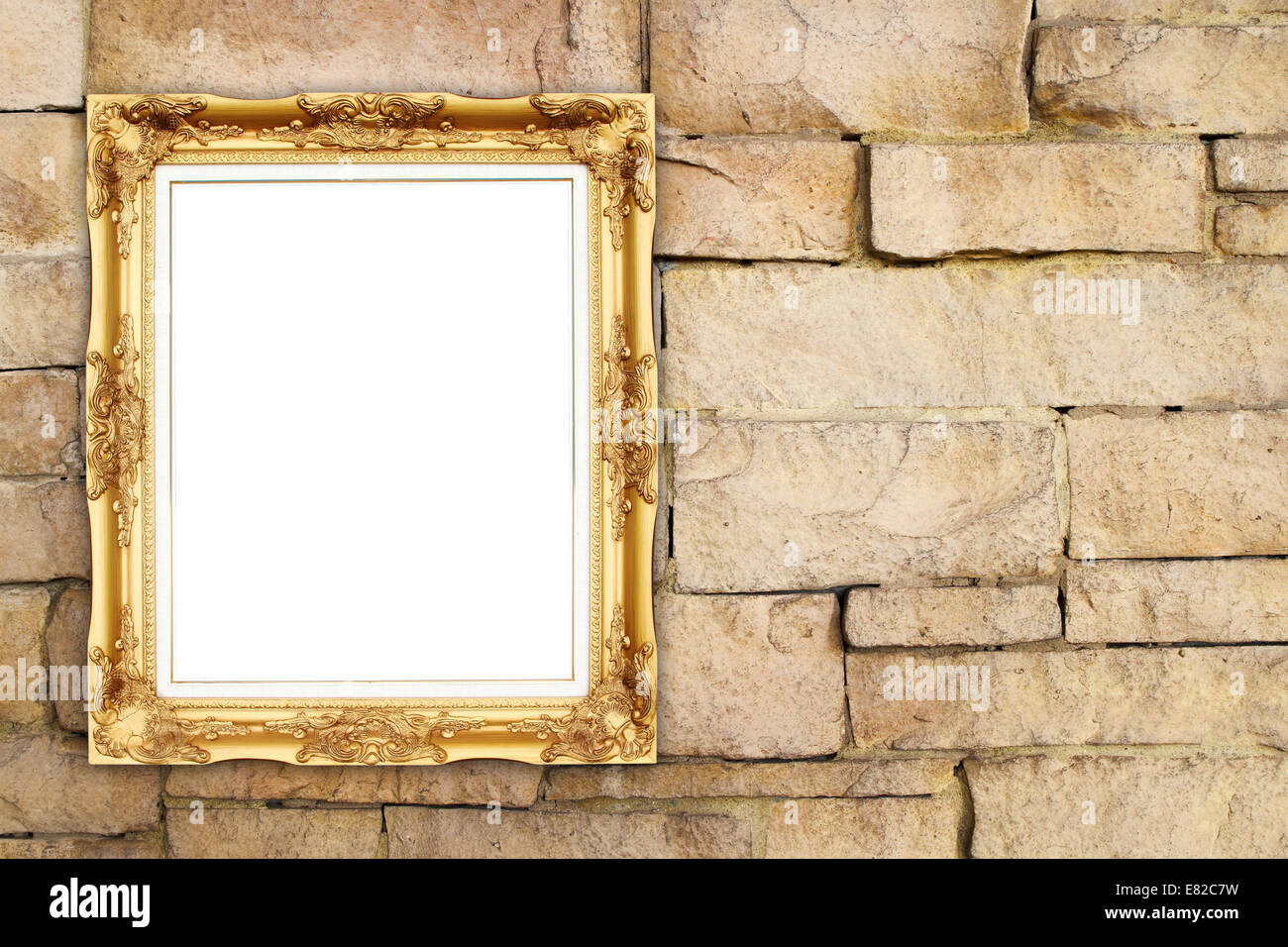 blank golden frame on brick stone wall background Stock Photo - Alamy