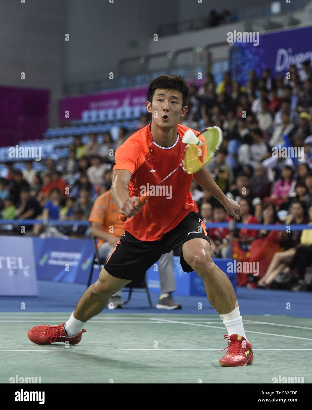 Incheon, South Korea. 29th Sep, 2014. Chen Long of China returns the ...