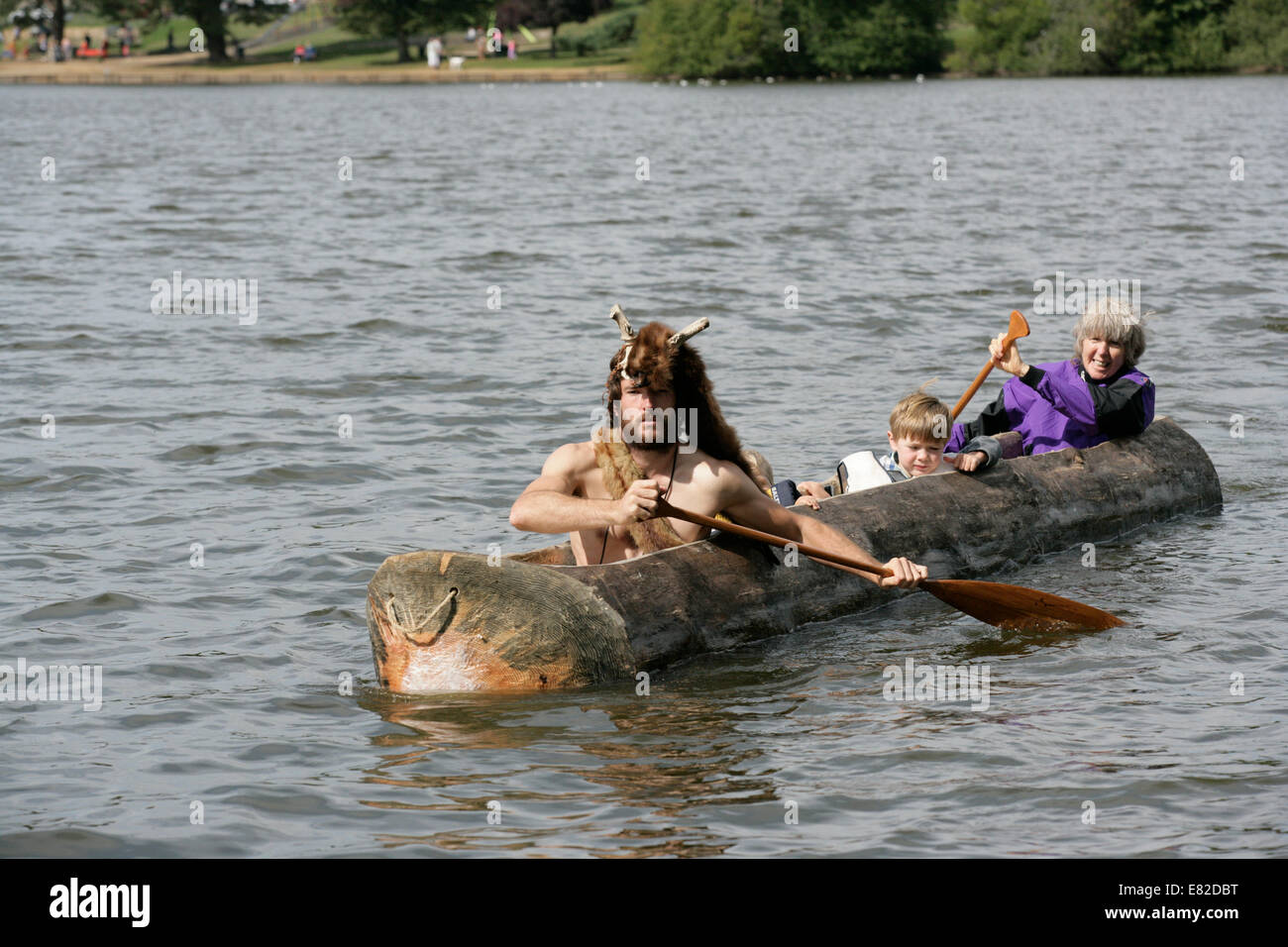 Iron-Age dug-out boat re-enactment Stock Photo - Alamy