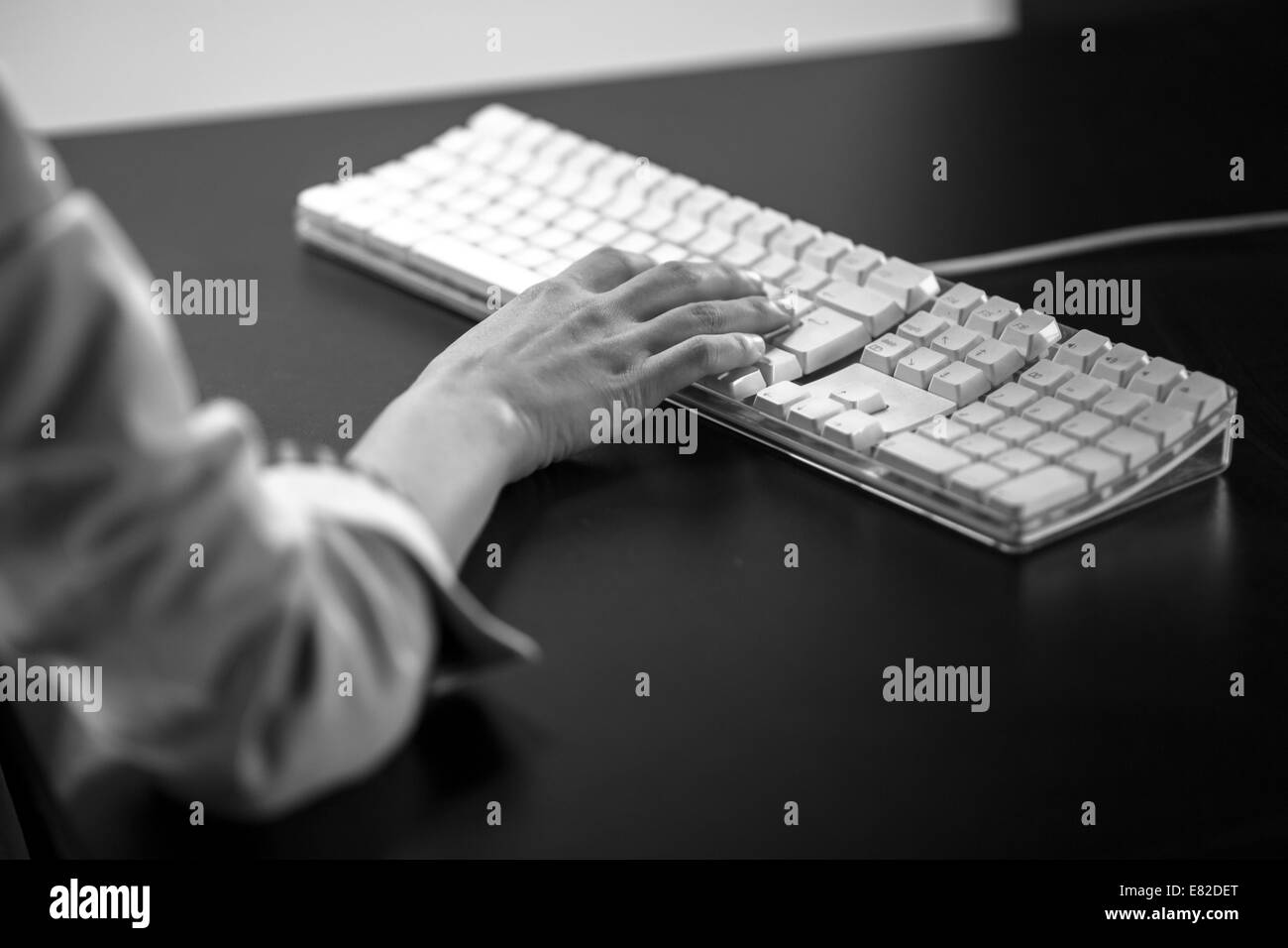 Black keyboard typing Black and White Stock Photos & Images - Alamy