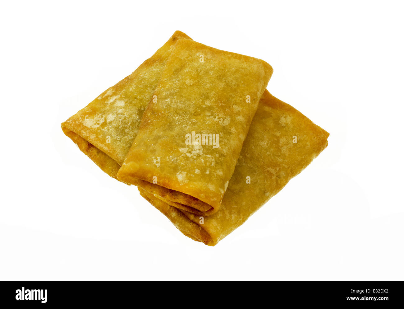 Three Spring Rolls on an isolated background Stock Photo - Alamy