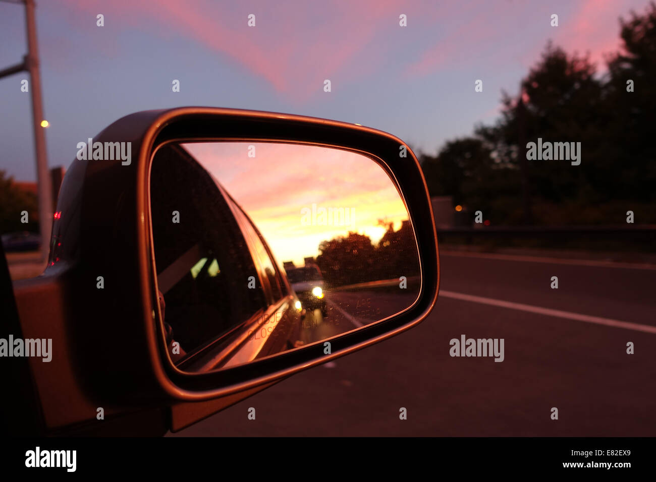 Side of car driving at sunset hi-res stock photography and images - Alamy