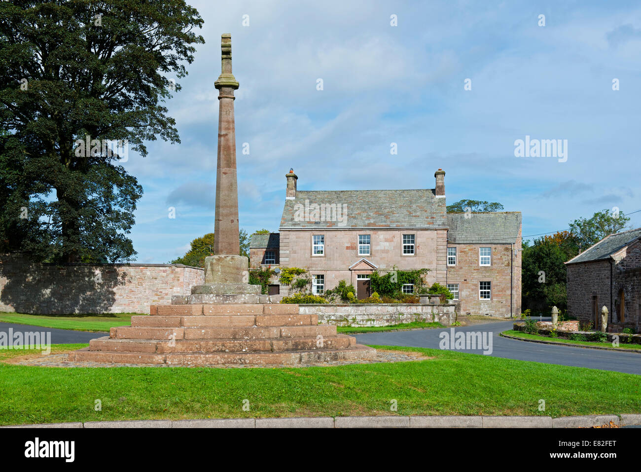 The cross and village green, Greystoke, Cumbria, England UK Stock Photo ...