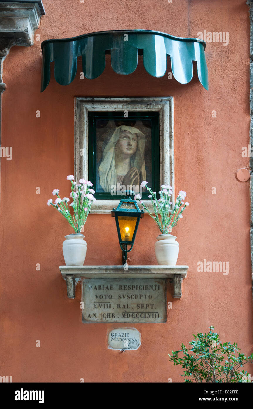 Tiny wall alter with image in Rome, Italy Stock Photo - Alamy