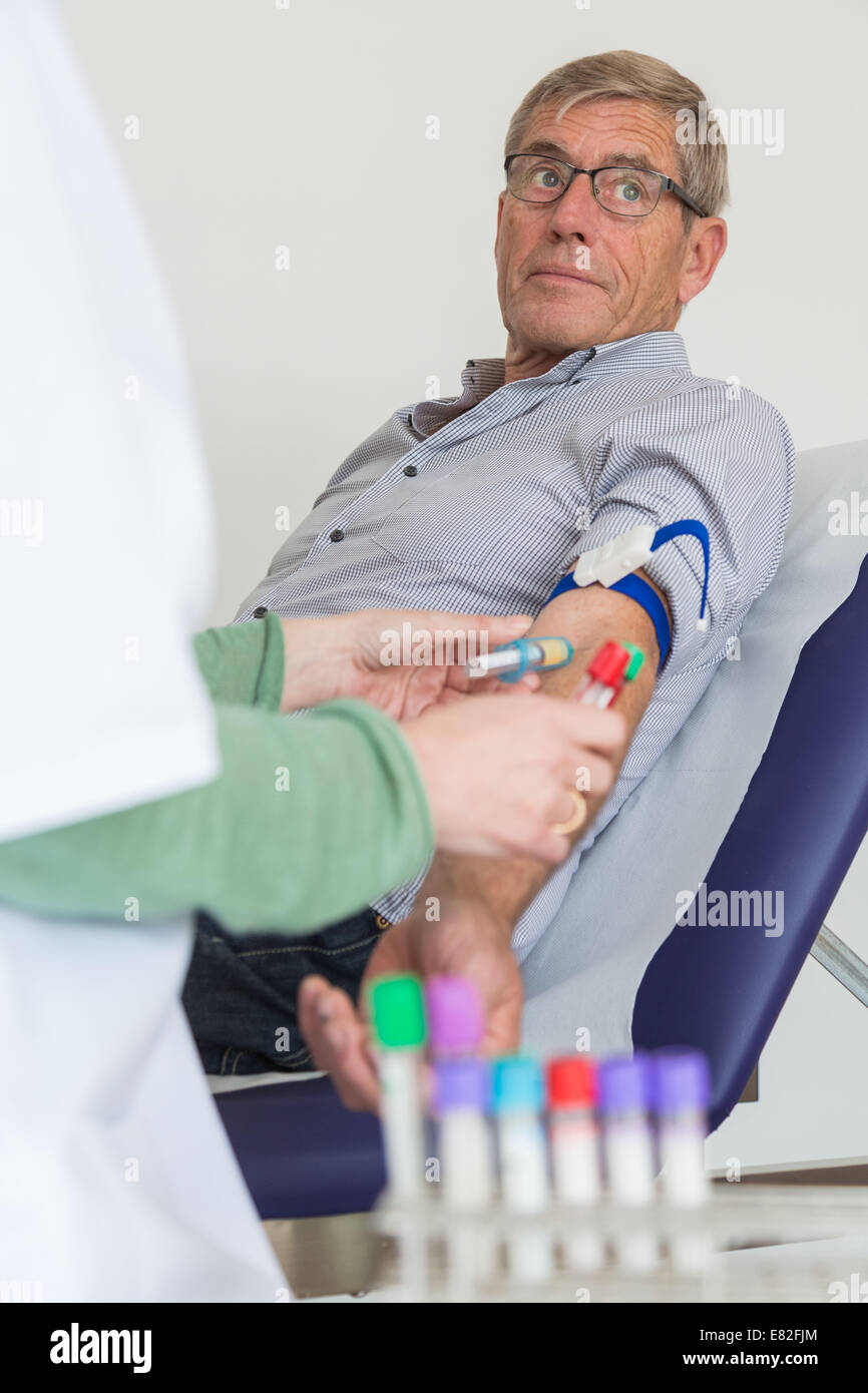 Man having blood sample Stock Photo - Alamy