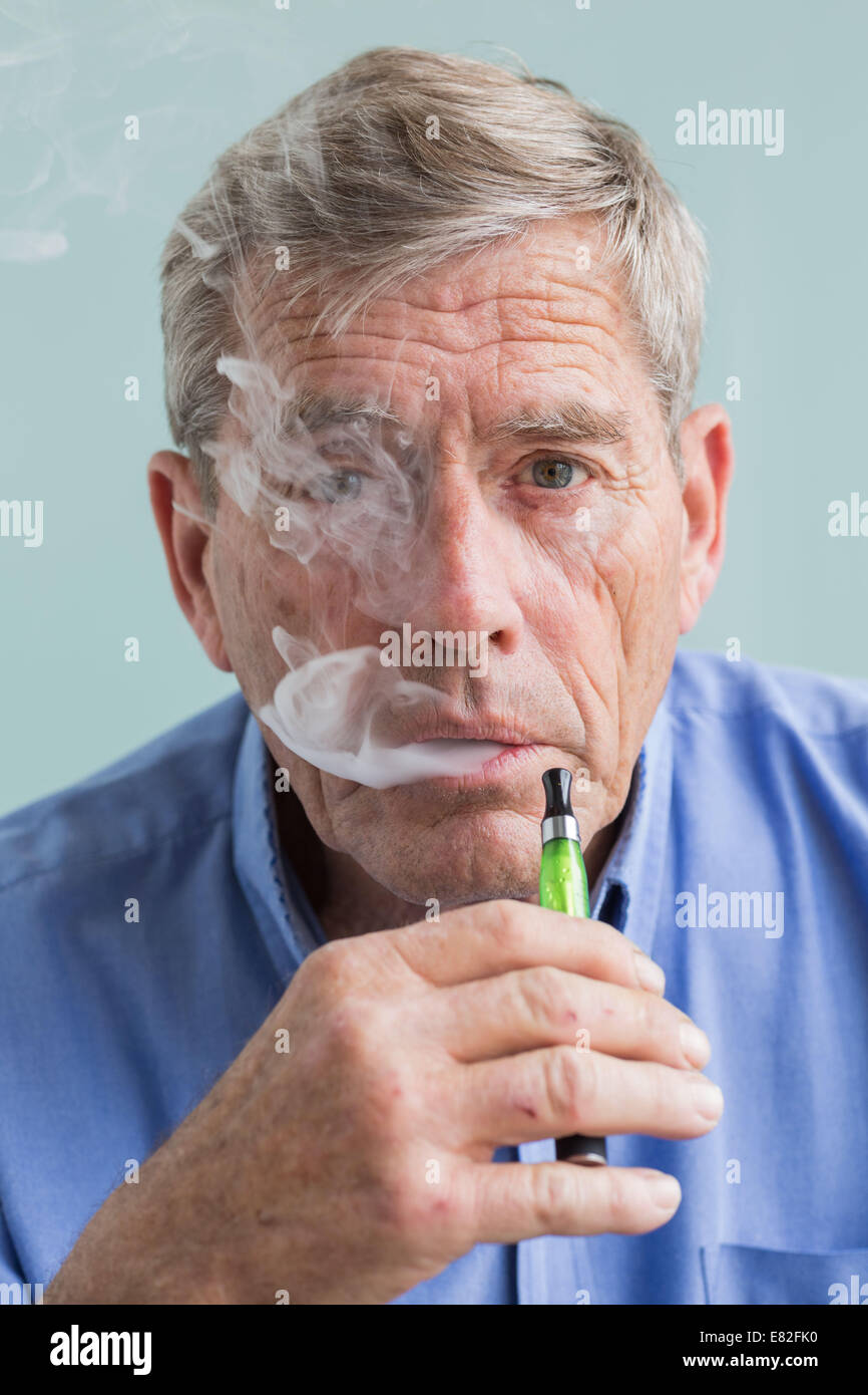 Elderly man vaping hi-res stock photography and images - Alamy
