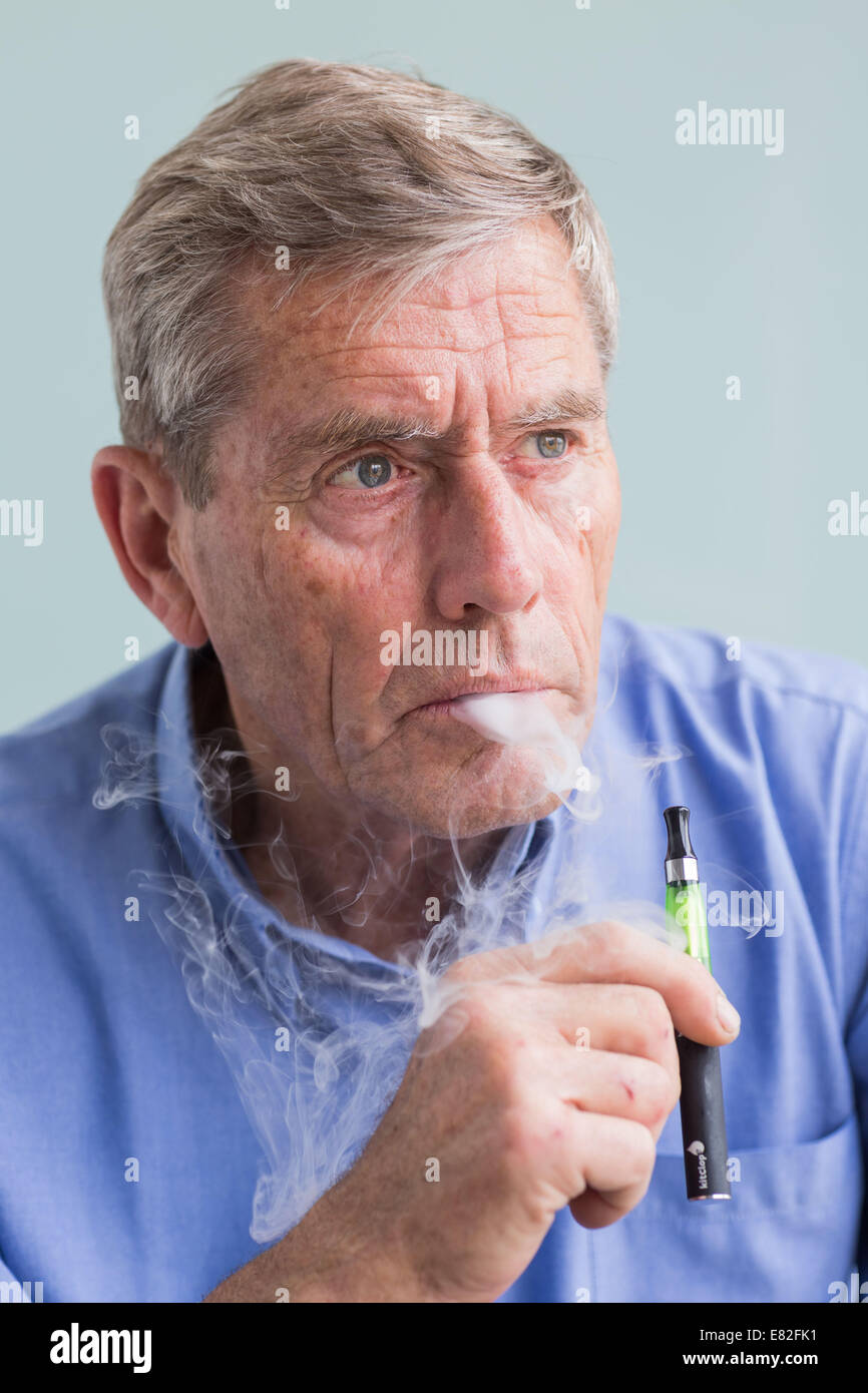 Elderly man vaping hi-res stock photography and images - Alamy
