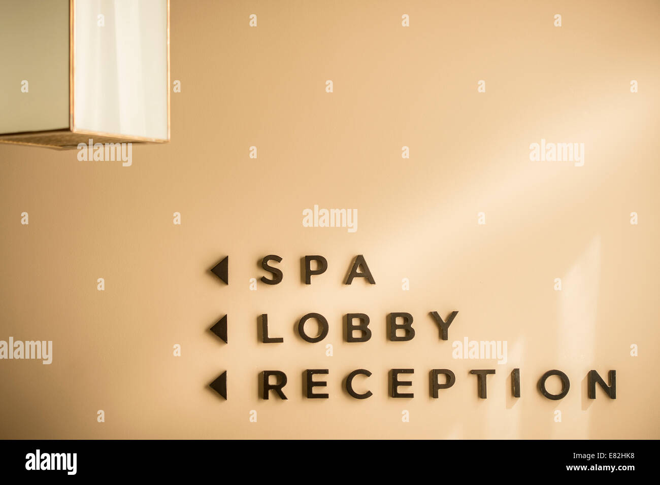 Direction signs of a wall in a hotel hi-res stock photography and ...