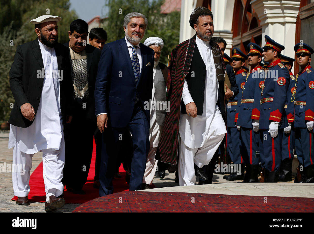 Kabul, Afghanistan. 29th Sep, 2014. Abdullah Abdullah (C) arrives for ...
