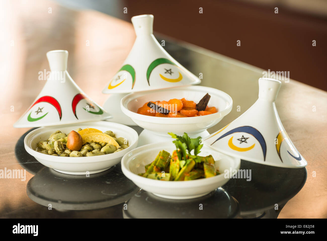 Three bowls of different moroccan starters Stock Photo - Alamy