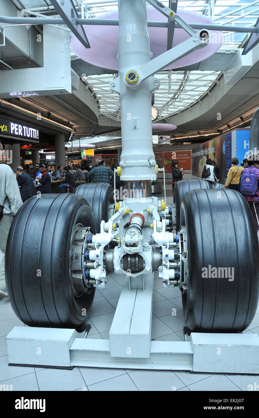 close up on undercarriage of plane in hall of Schiphol international ...