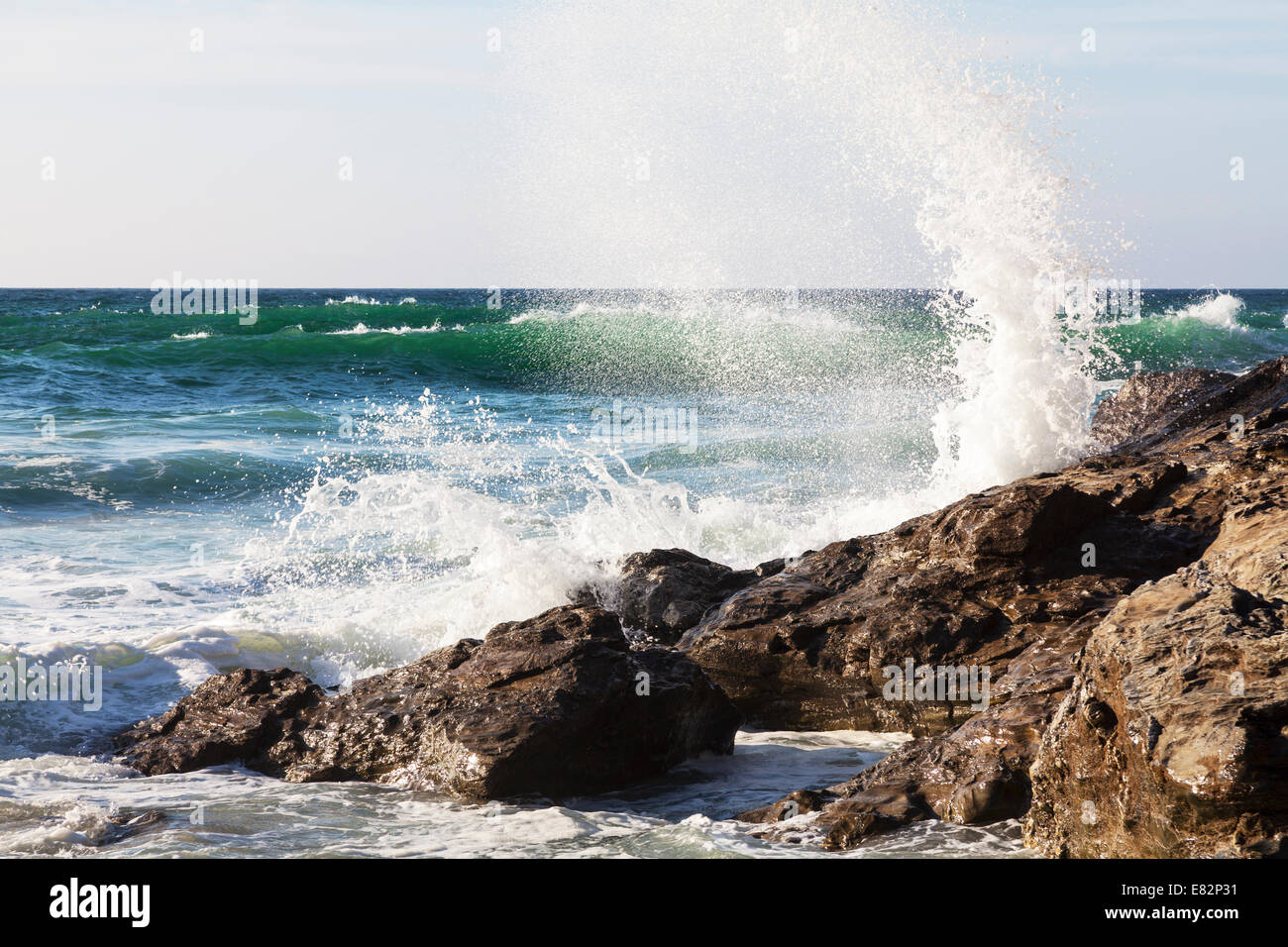 watergate bay sea crashing against rock rugged Cornwall coast coastline ...