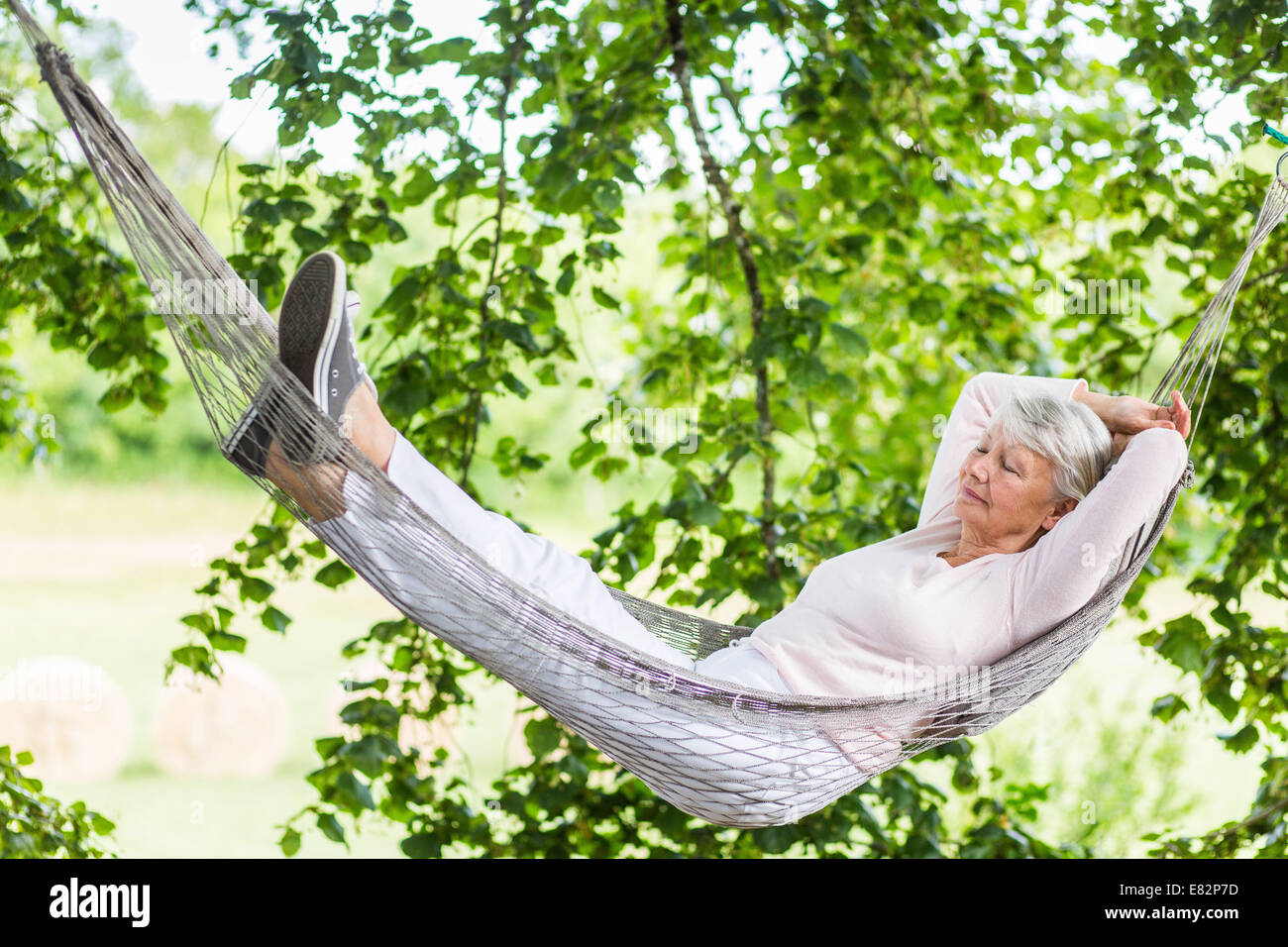 Elderly woman hammock hi-res stock photography and images - Alamy