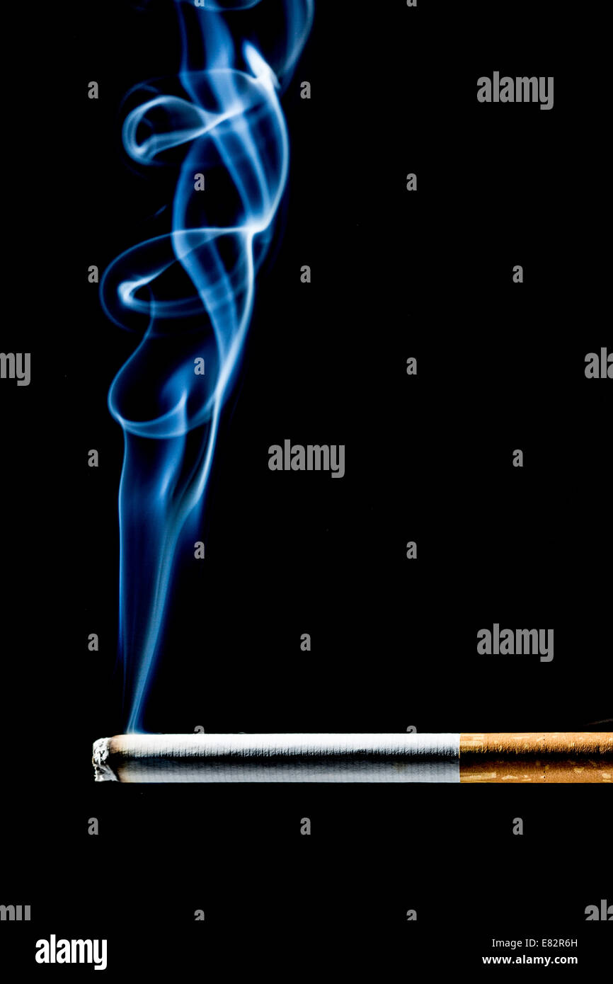 Lit cigarette tobacco cigarettes hi-res stock photography and images ...
