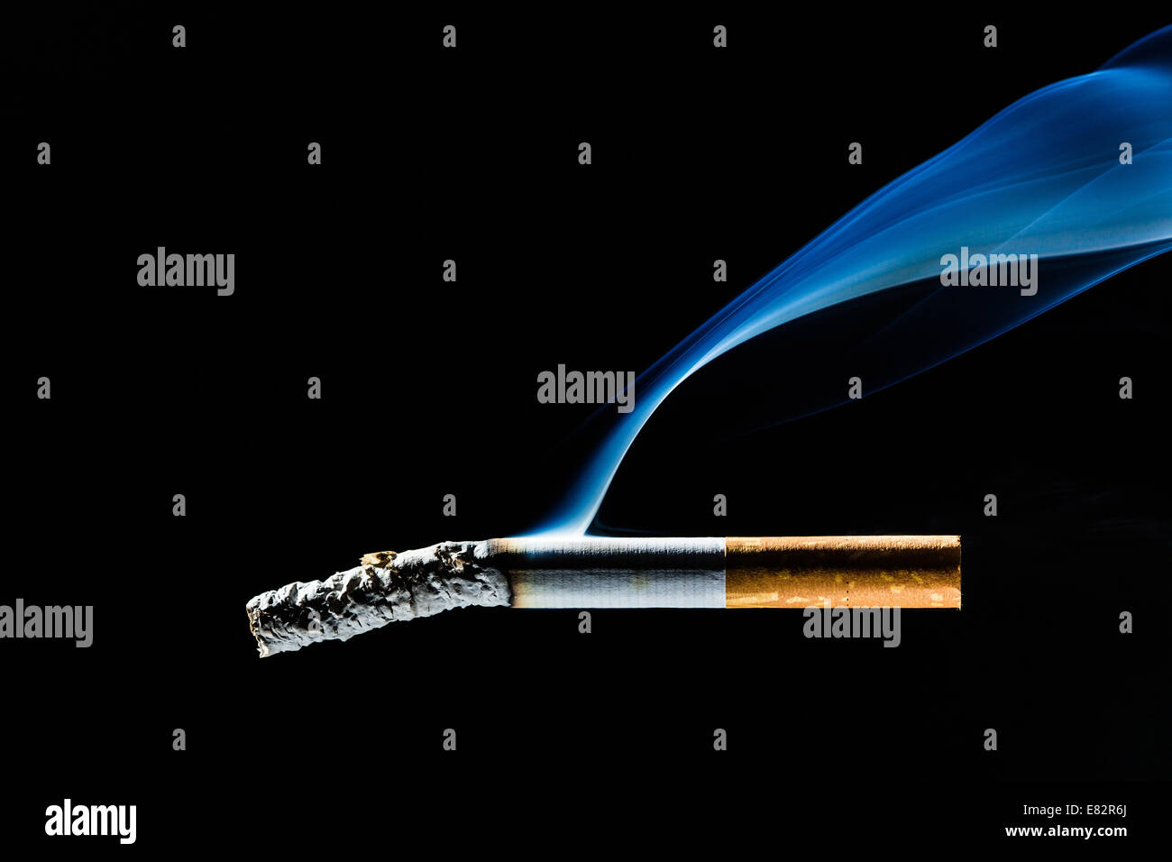 Lit cigarette hi-res stock photography and images - Alamy