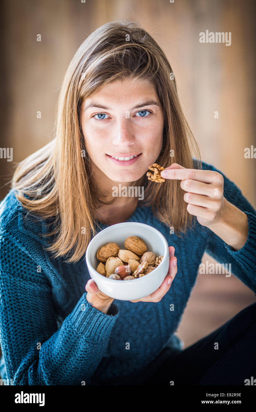 Woman nuts looking at camera hi-res stock photography and images - Alamy