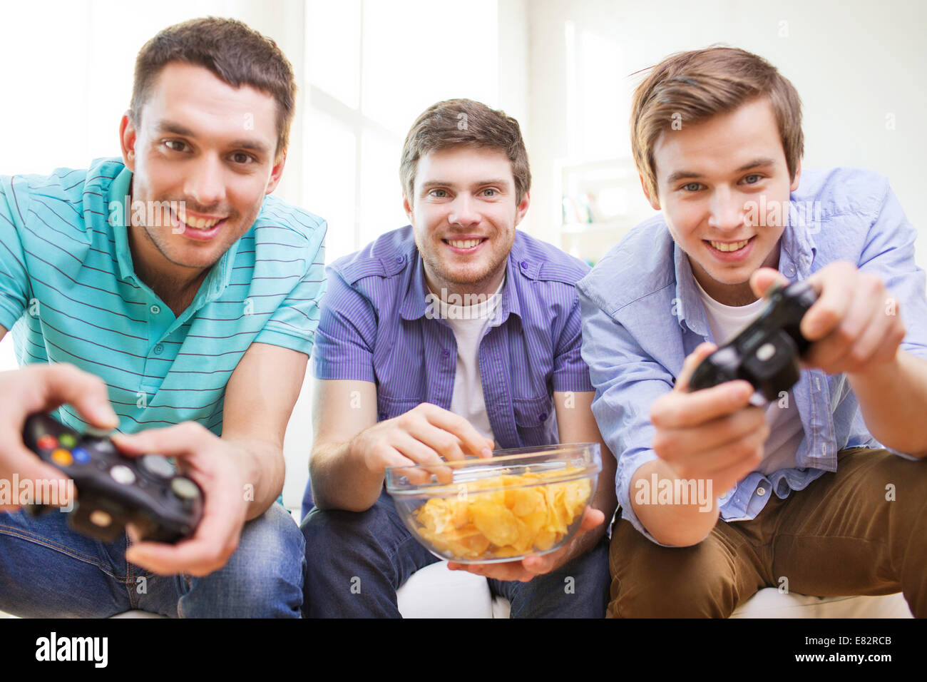 Playing video games hi-res stock photography and images - Alamy