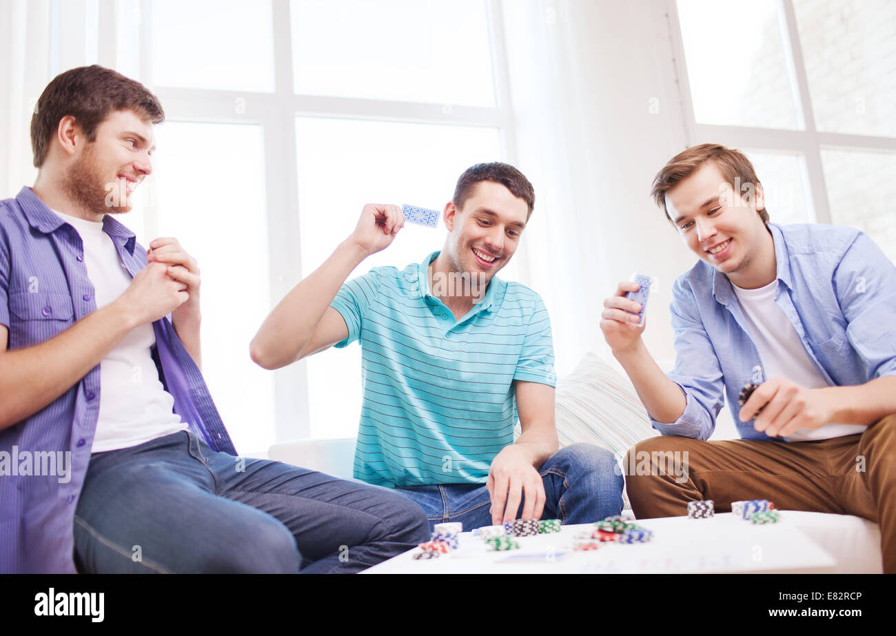 Smiling male friends playing hi-res stock photography and images - Alamy