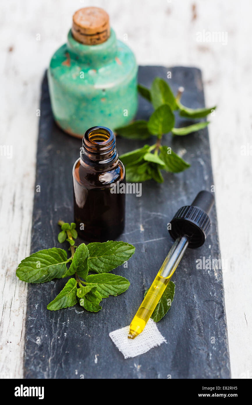 Essential oil of peppermint Stock Photo - Alamy