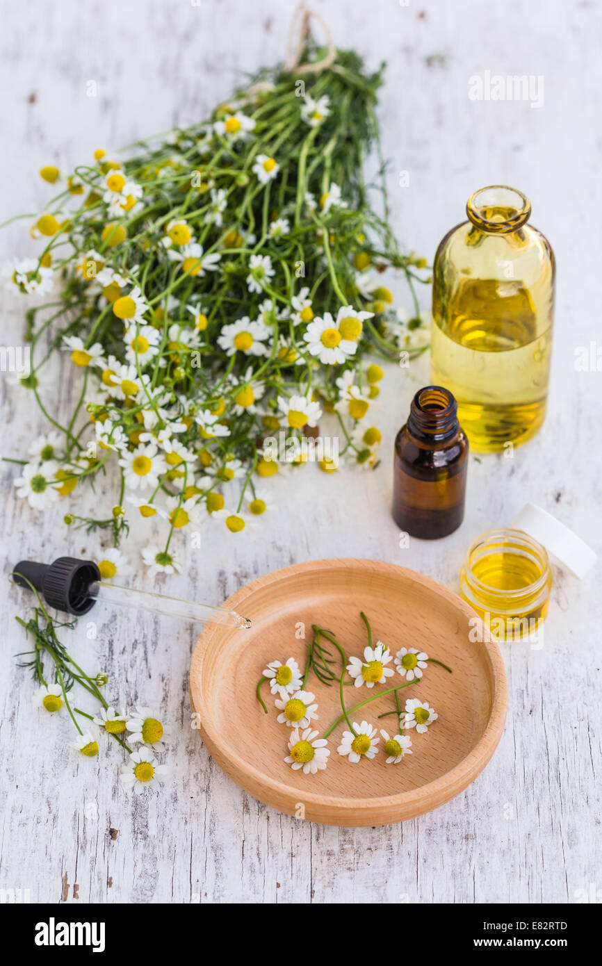 Essential oil of chamomile Stock Photo - Alamy