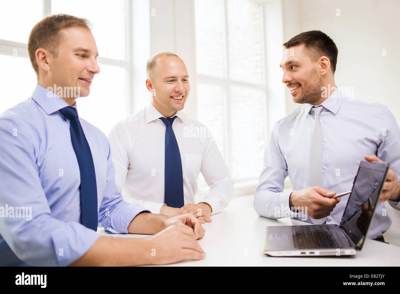 Successful businessmen having brainstorming hi-res stock photography ...