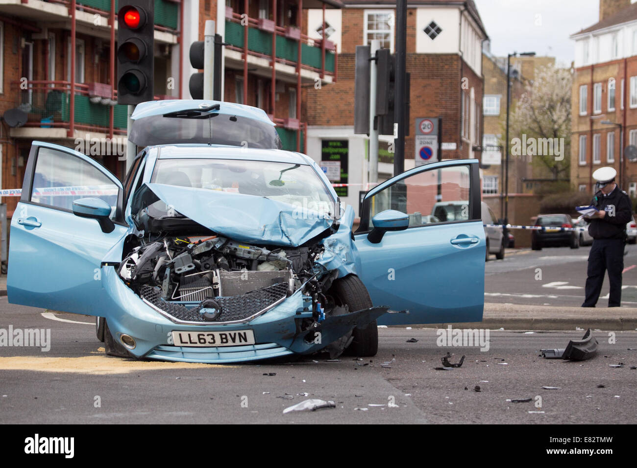 A police riot van flips over on its side after crashing into a ...