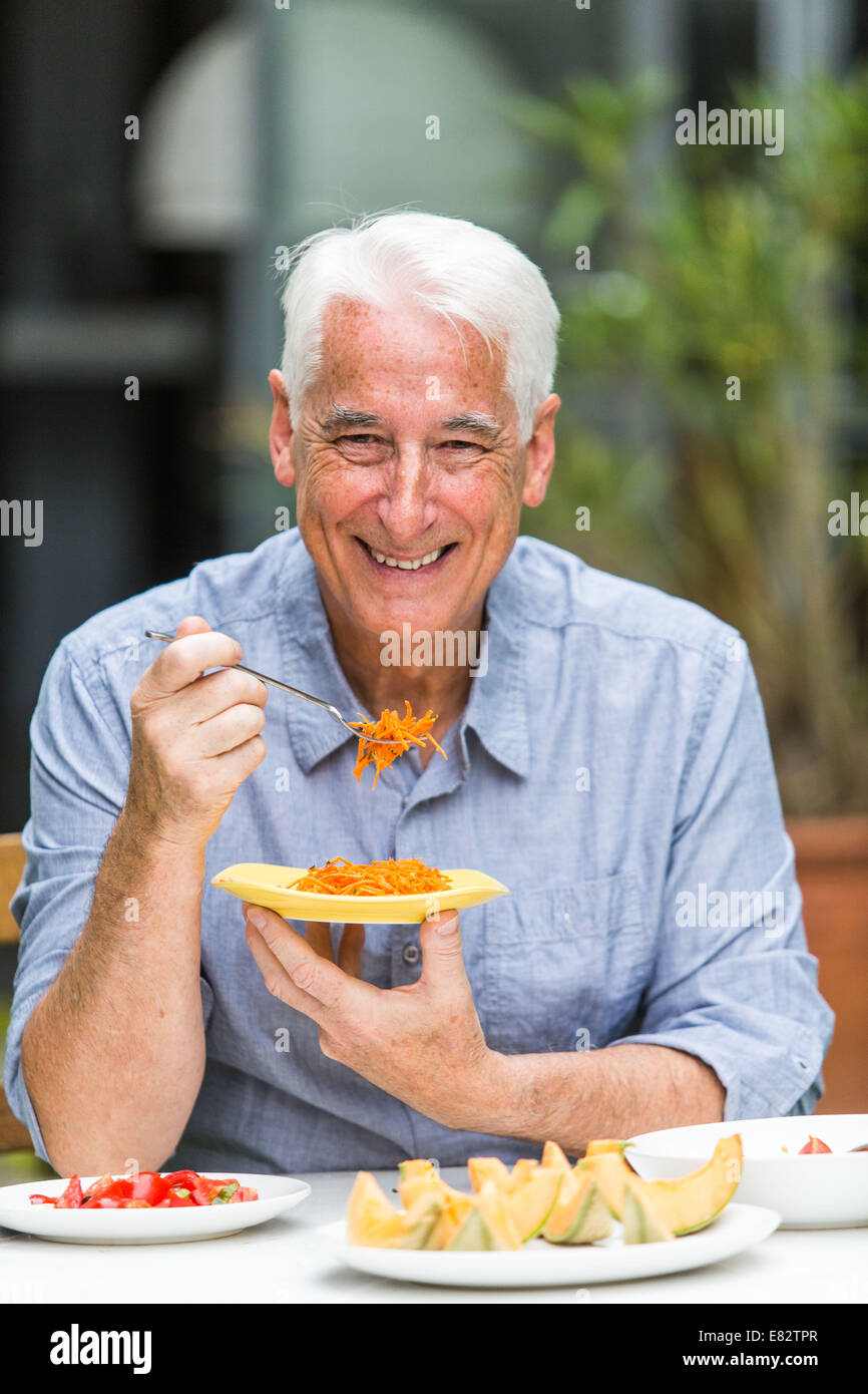 Old man eating eat hi-res stock photography and images - Alamy