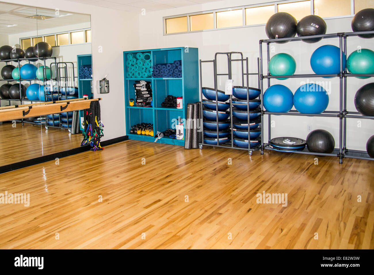 gym equipment for exercise, balls, weights, mats Stock Photo - Alamy
