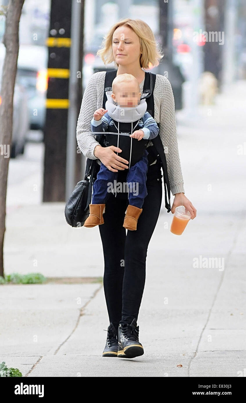 Malin Akerman out and about with son Sebastian, being carried in a ...