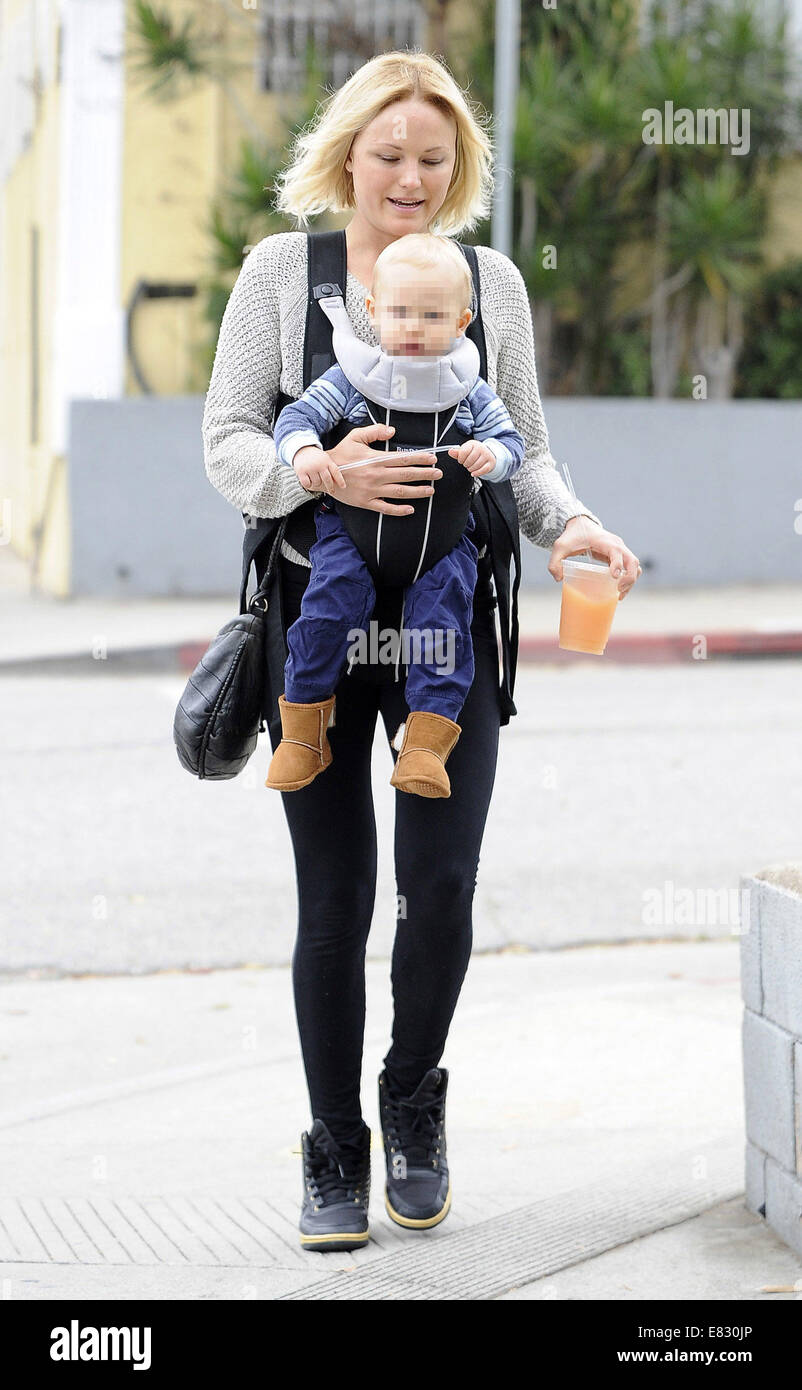 Malin Akerman out and about with son Sebastian, being carried in a ...