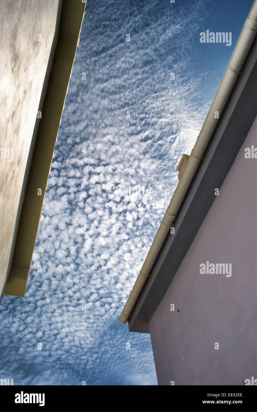 Rooftop with blue sky and clouds Stock Photo - Alamy