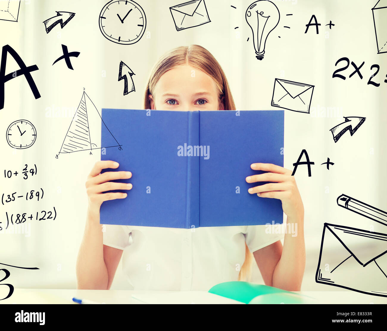 girl studying and reading book at school Stock Photo - Alamy