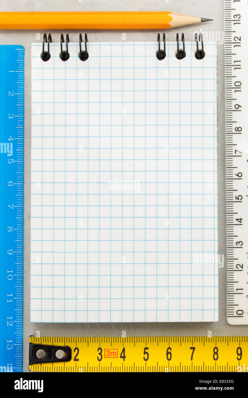 checked note paper at metal background texture Stock Photo - Alamy