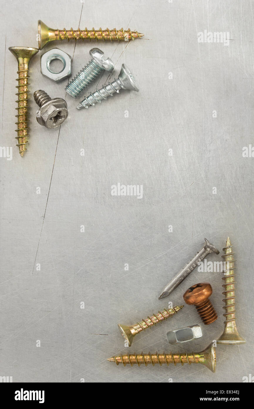 bolts, screws and nuts tool at metal background texture Stock Photo - Alamy