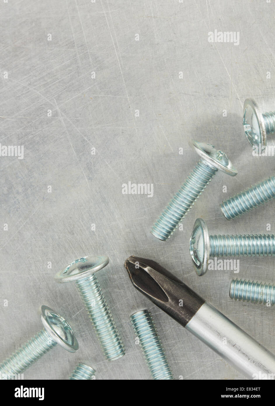 screws tool at metal background texture Stock Photo - Alamy