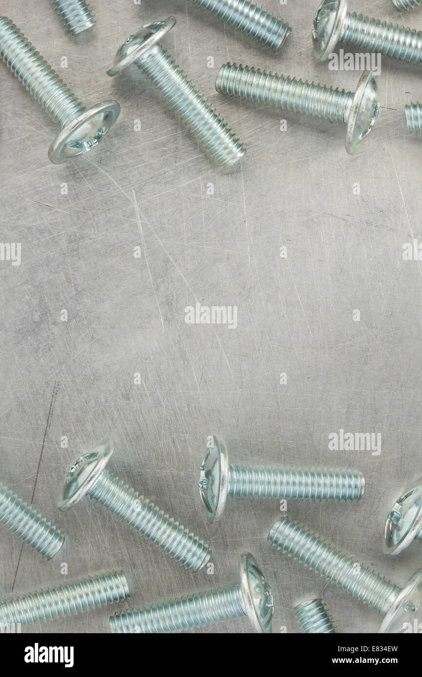 bolts tool at metal background texture Stock Photo - Alamy