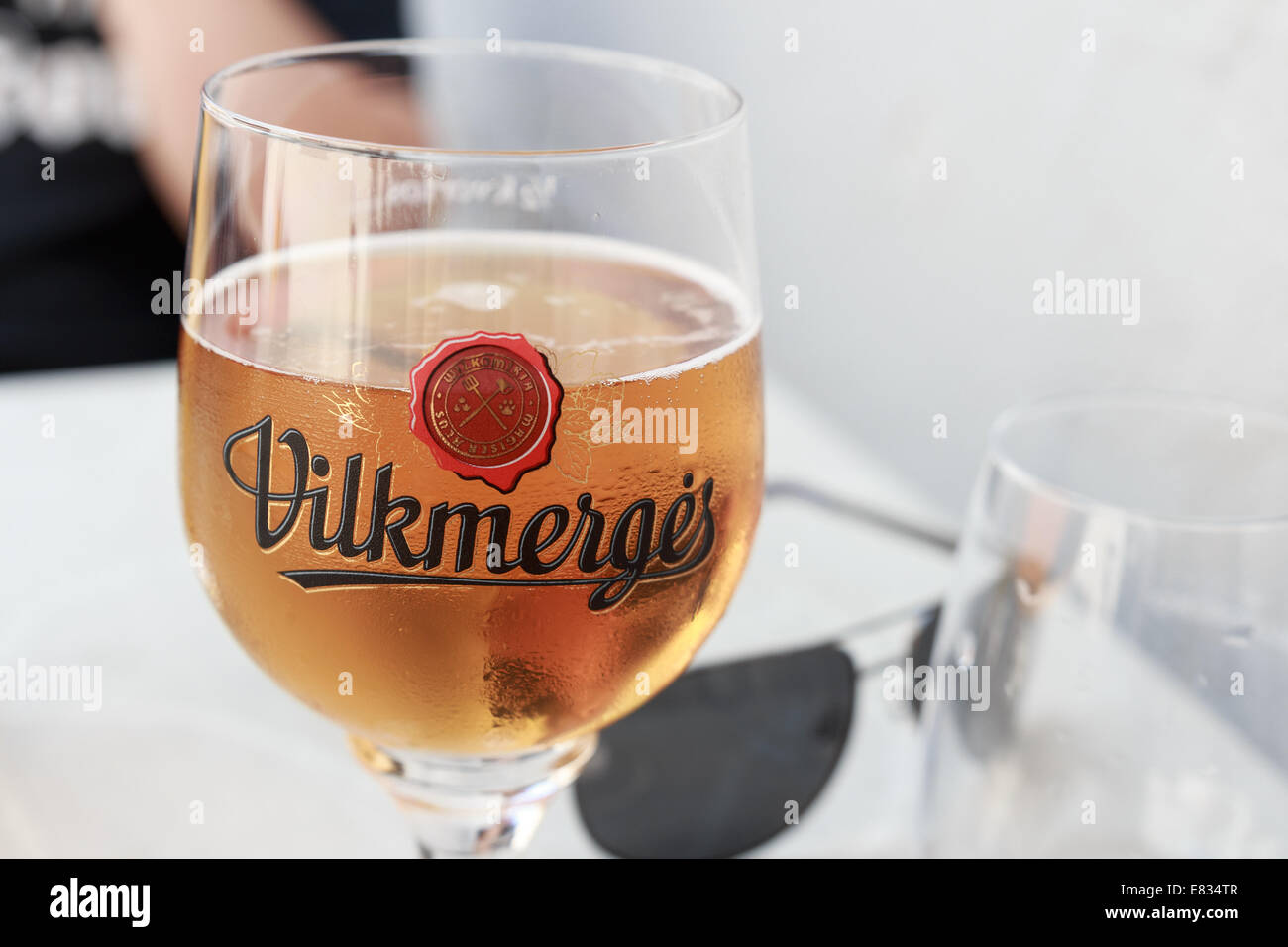 A glass of Vilkerges beer in Vilnius Stock Photo - Alamy