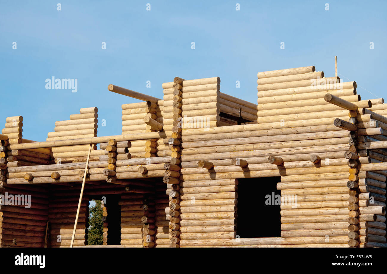 Unfinished, ecological wooden house and building area Stock Photo - Alamy