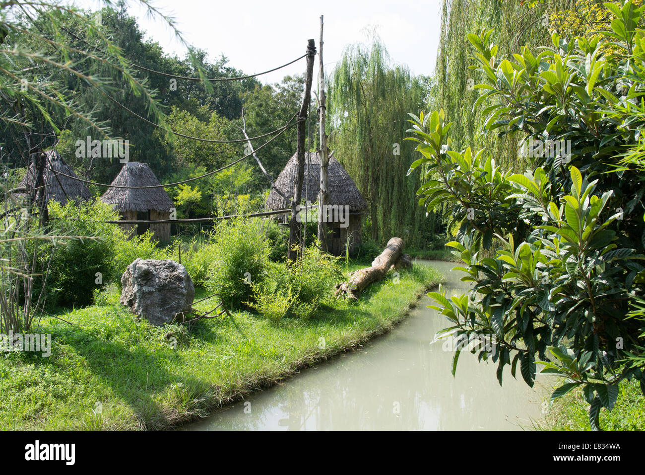 thatched hut on the river bank Stock Photo - Alamy