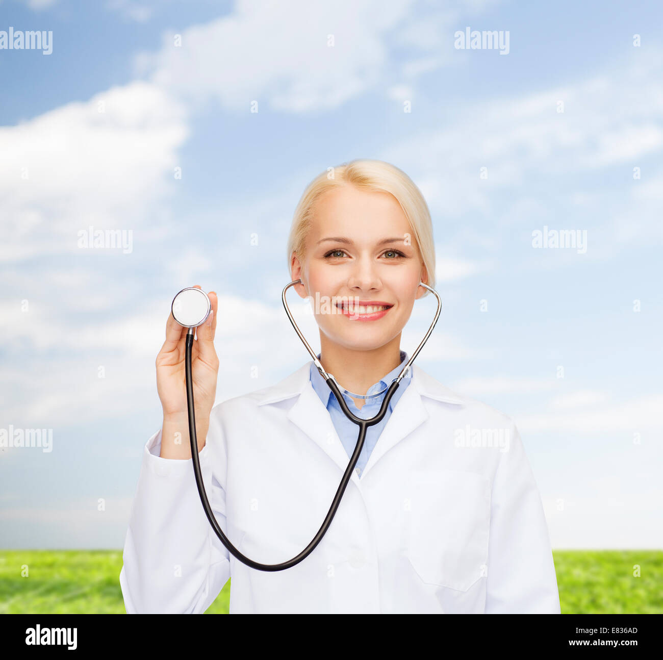 smiling female doctor with stethoscope Stock Photo - Alamy