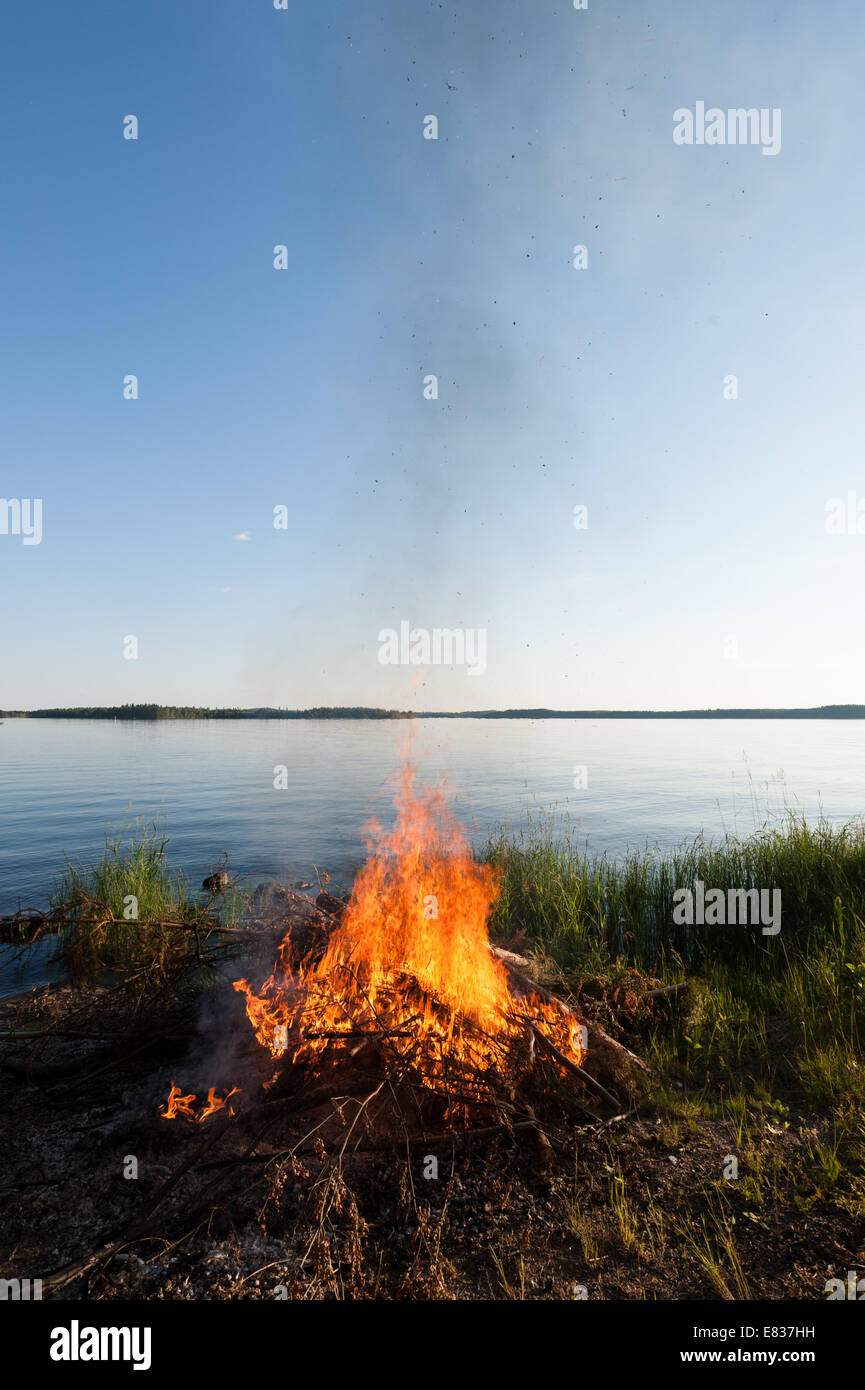 Midsummer night's bonfire by lake Päijänne, Finland Stock Photo - Alamy