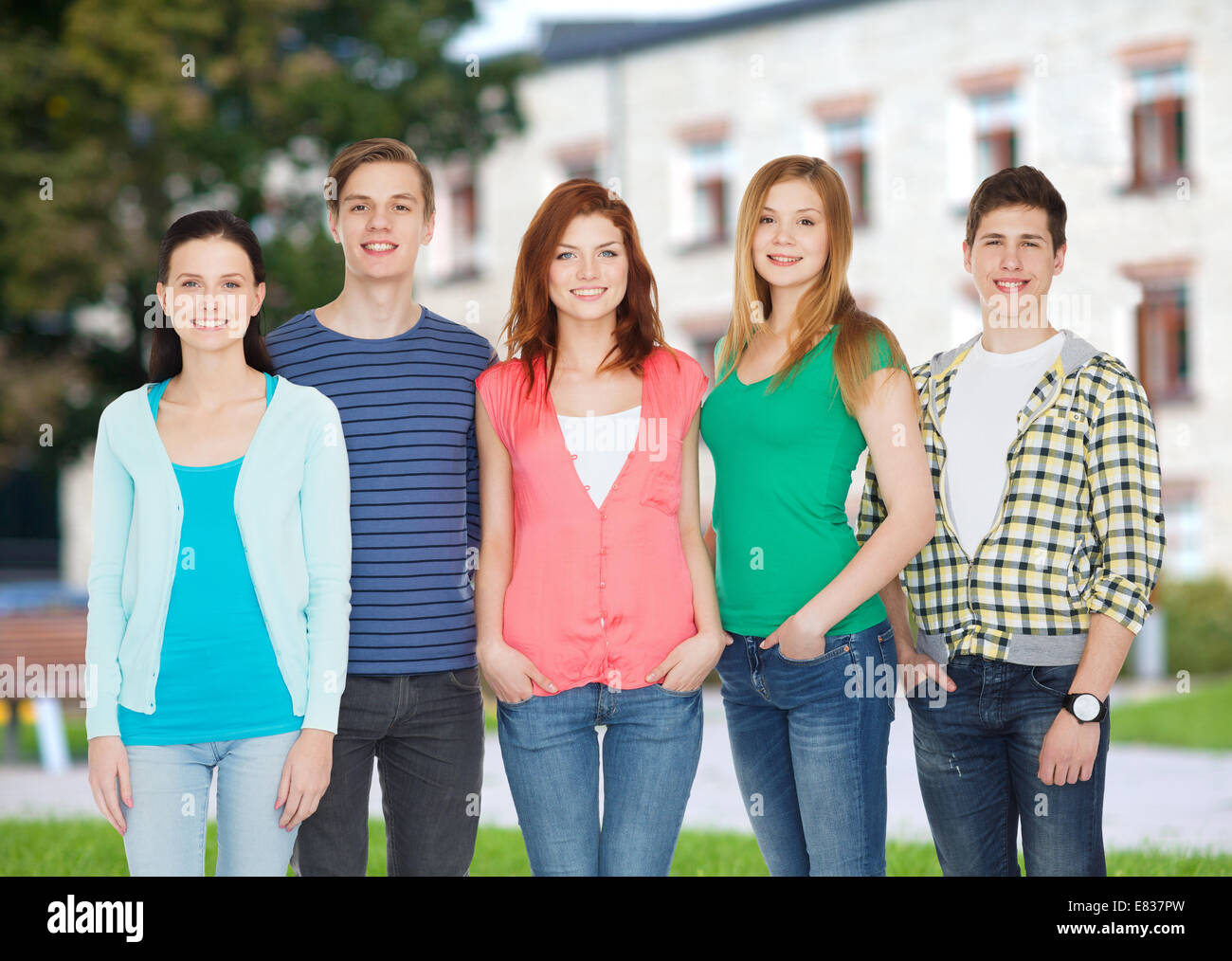 group of smiling students standing Stock Photo - Alamy