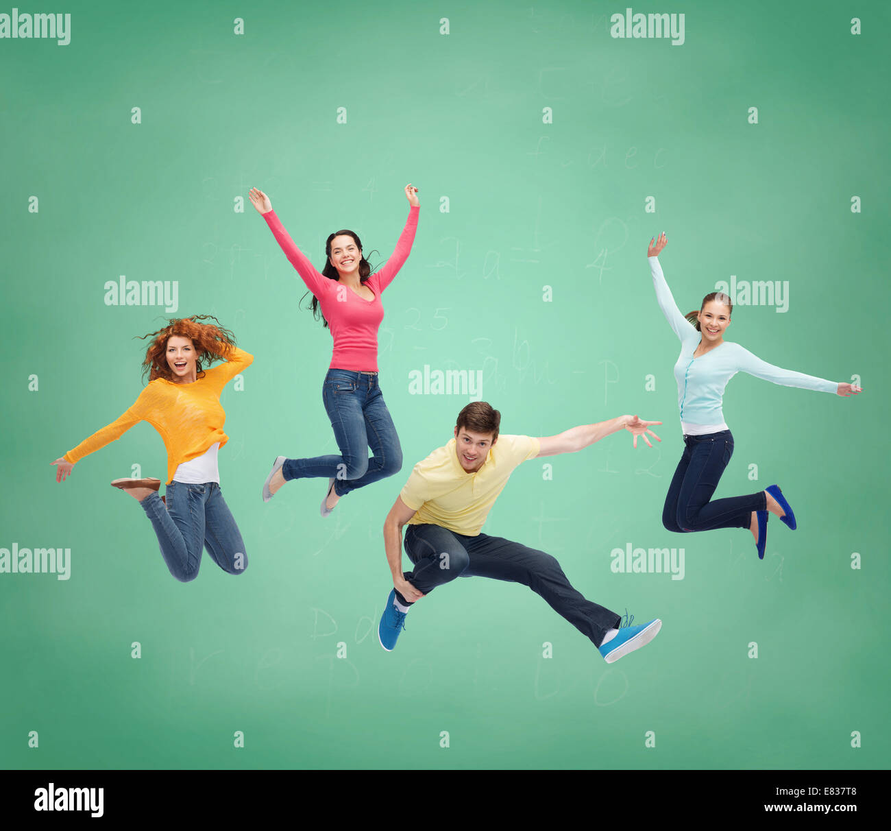 group of smiling teenagers jumping in air Stock Photo - Alamy